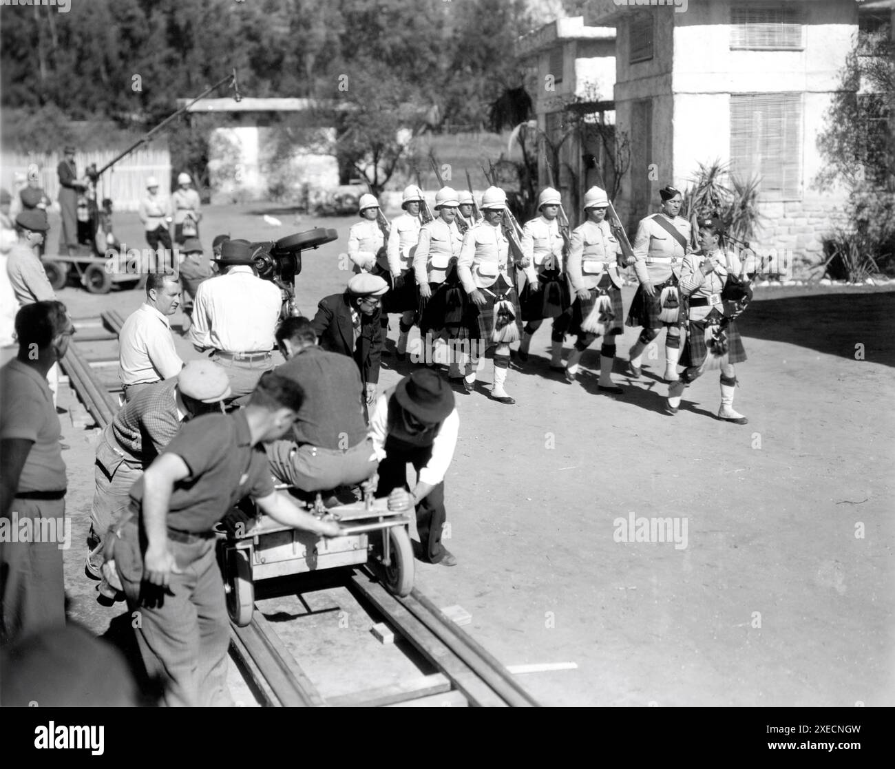 Camera / Movie Crew filming VICTOR McLAGLEN and CLYDE COOK marching ...