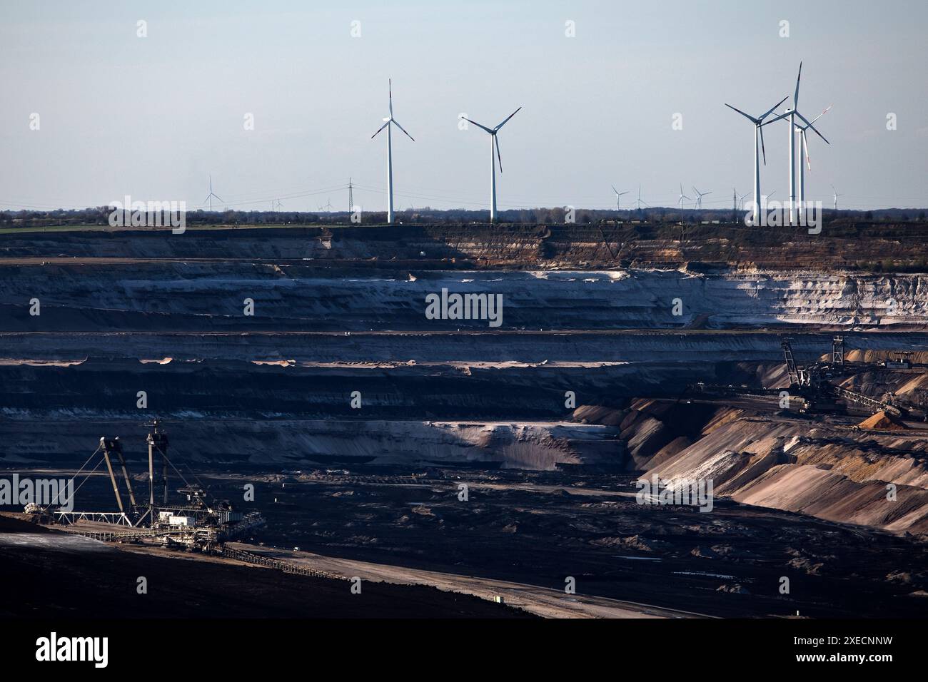 Garzweiler opencast brown coal mine with spreader and wind turbines ...
