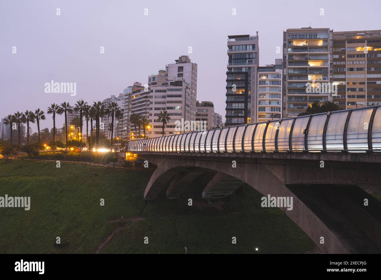 Bridge over a river with a Lima city in the background. Miraflores ...