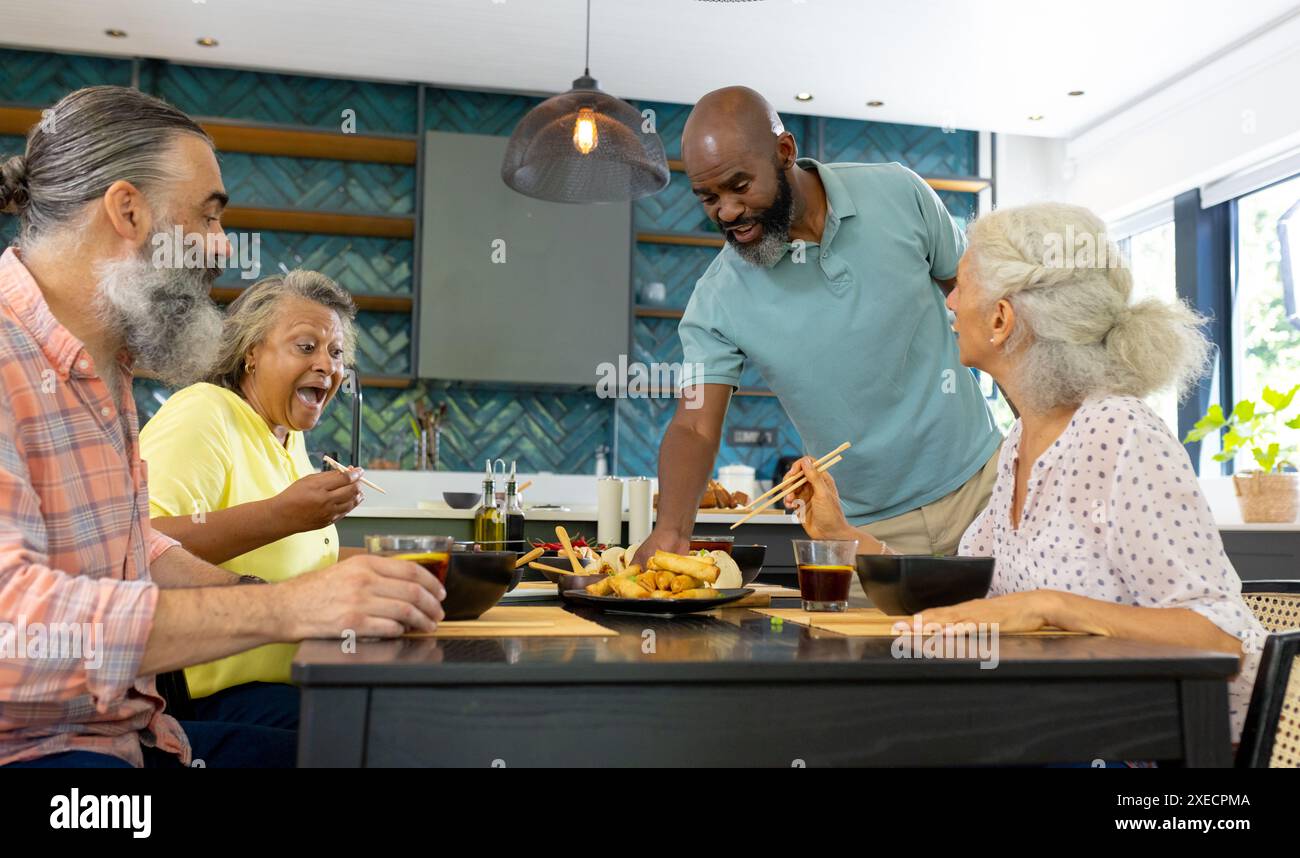 Elderly senior serving dinner hi-res stock photography and images - Alamy