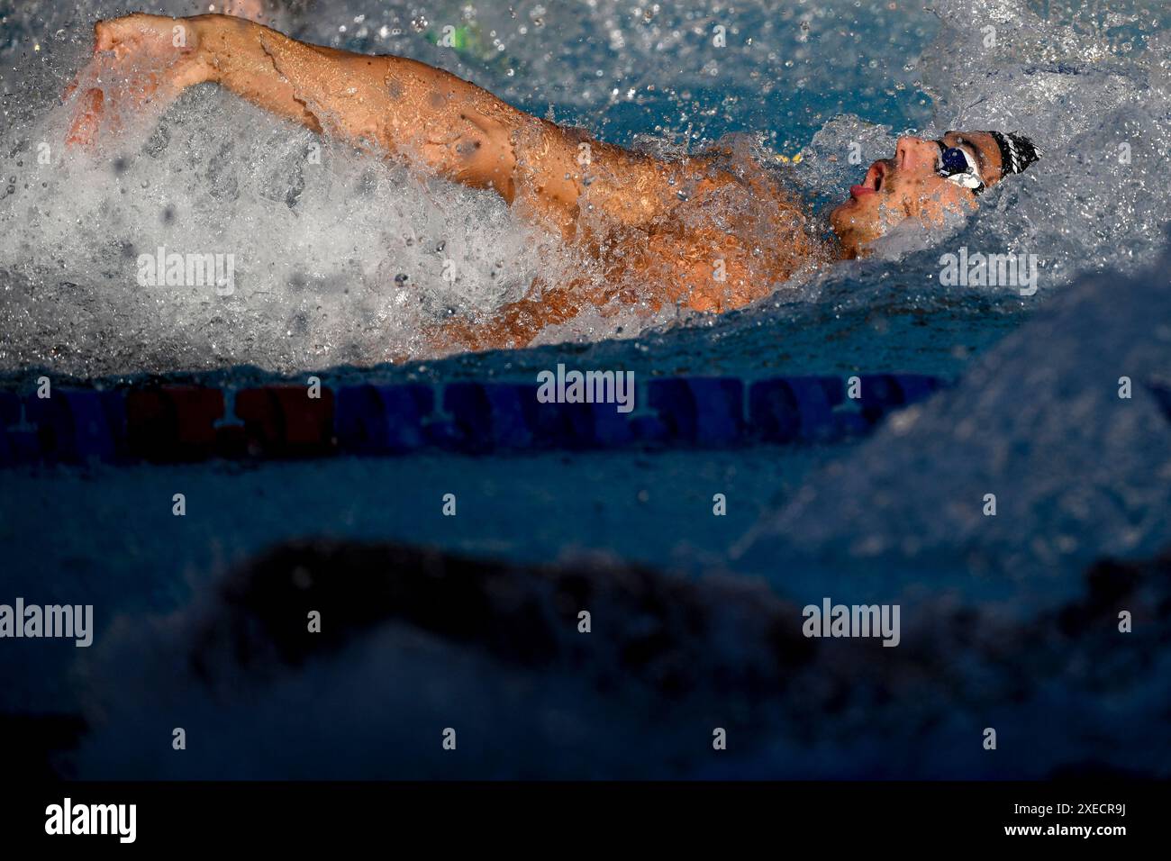 Thomas Ceccon of Italy competes in the 50m Backstroke Men Final during ...