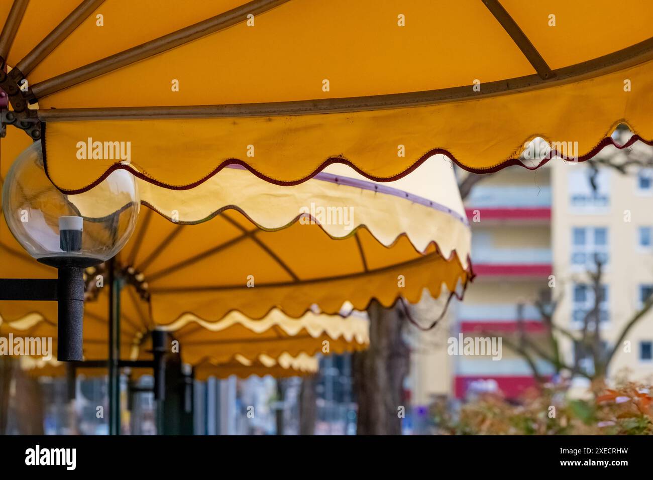 Yellow awning in front of a department store in the city Stock Photo ...