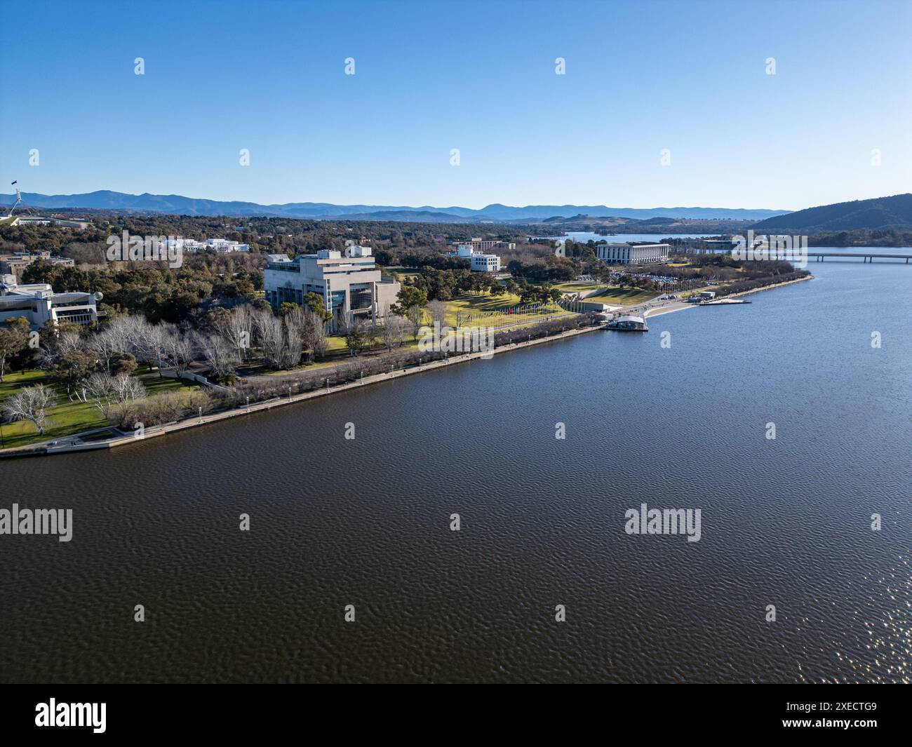 Aerial view of the National Library of Australia and Lake Burley Griffin in Canberra with clear ...
