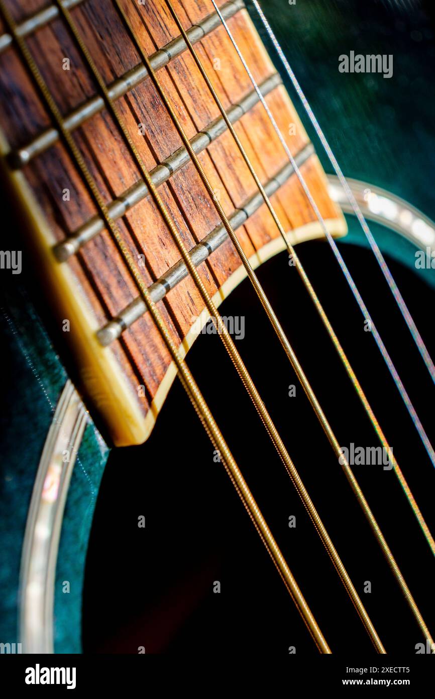 Close up of an acoustic guitar with steel strings Stock Photo - Alamy