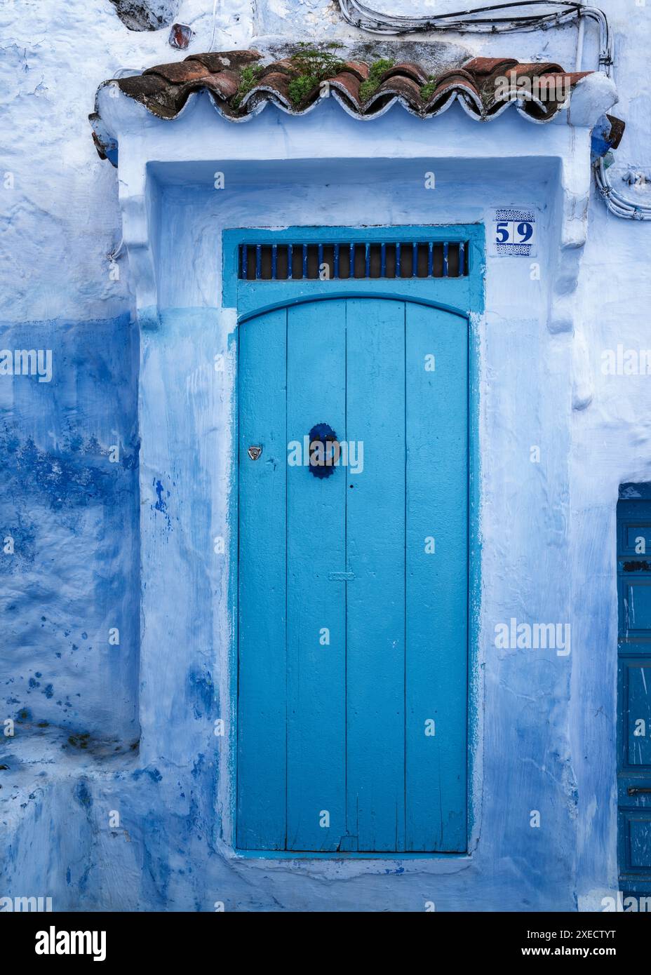 Close-up view of a house front and door in the historic city center of ...