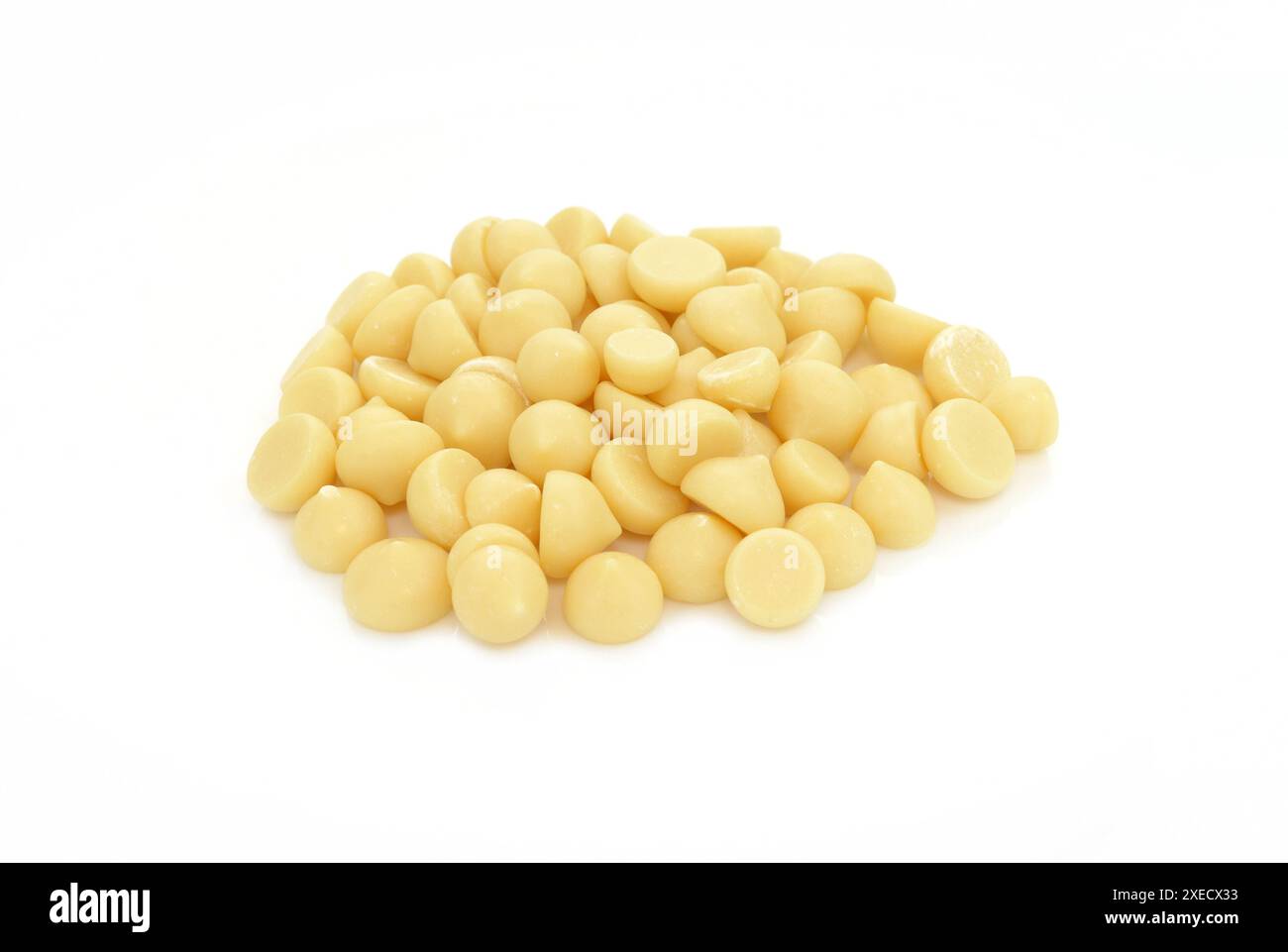 Organic cocoa butter buttons (wafers) isolated on white background ...