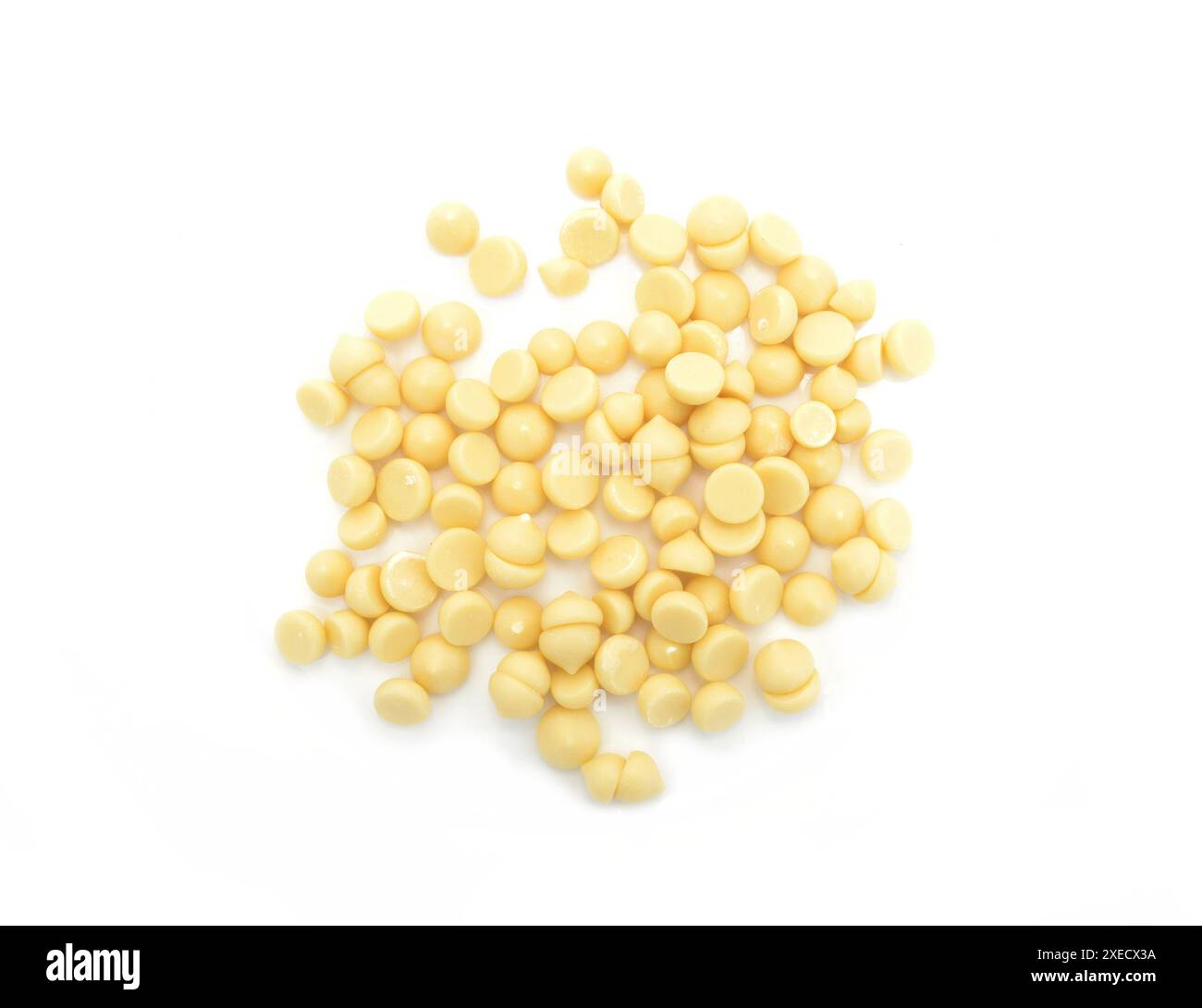 Organic cocoa butter buttons (wafers) isolated on white background ...