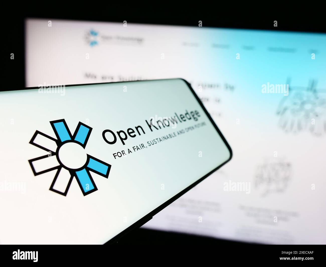 Smartphone with logo of global organisation Open Knowledge Foundation ...