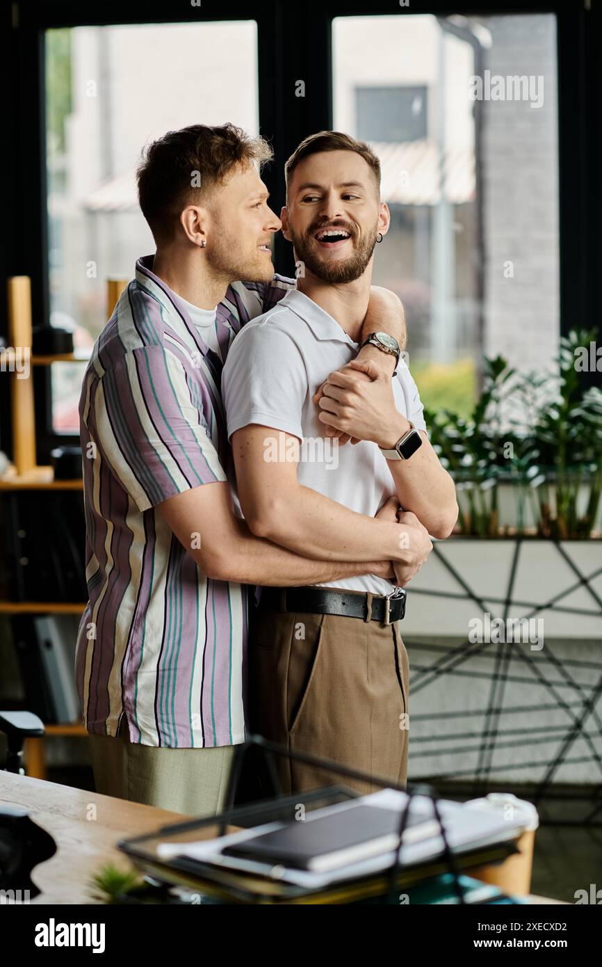Two men in office attire stand together Stock Photo - Alamy