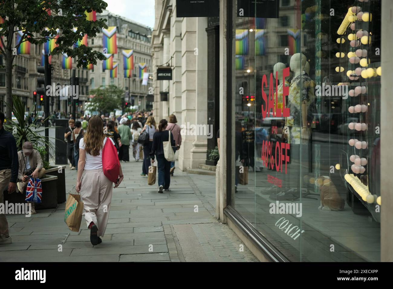 LONDON- JUNE 18, 2024: Regent Street shopping street scene. Landmark London retail destination ...