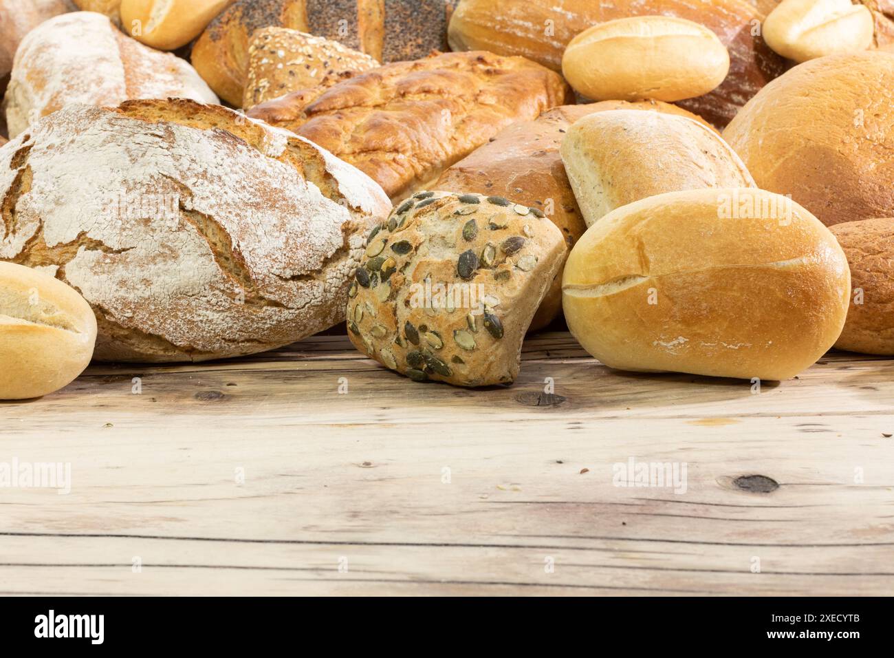 Many kinds and kinds of bread collected in one place on a wooden old ...