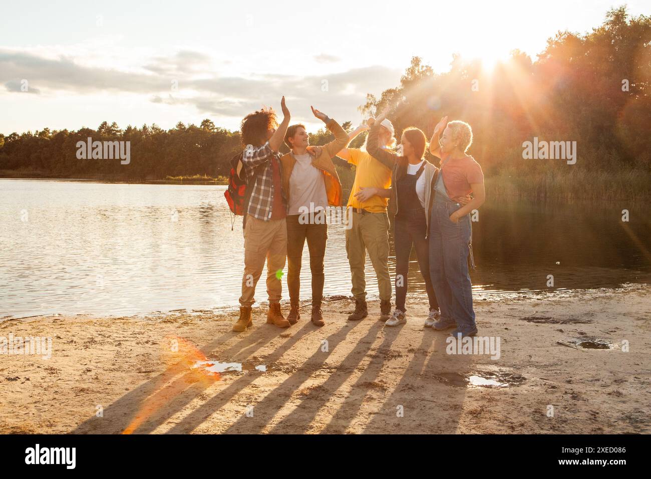 Group silhouettes sunset hi-res stock photography and images - Alamy