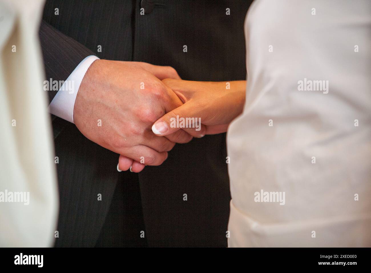 Intimate Exchange of Wedding Rings Between Partners Stock Photo - Alamy