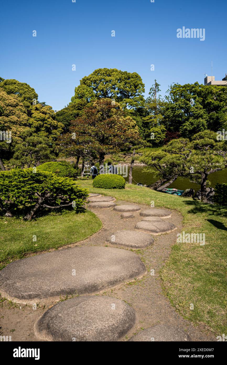 A path with stepping stones in Kiyosumi Teien, a traditional Japanese ...