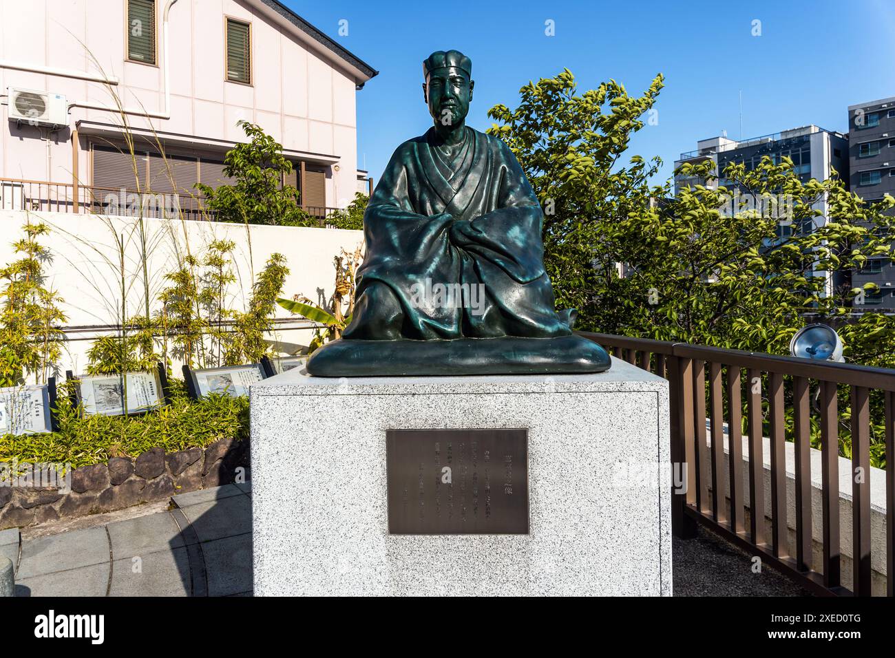 Statue of Japanese poet Matsuo Basho in the Basho Heritage Garden, in ...