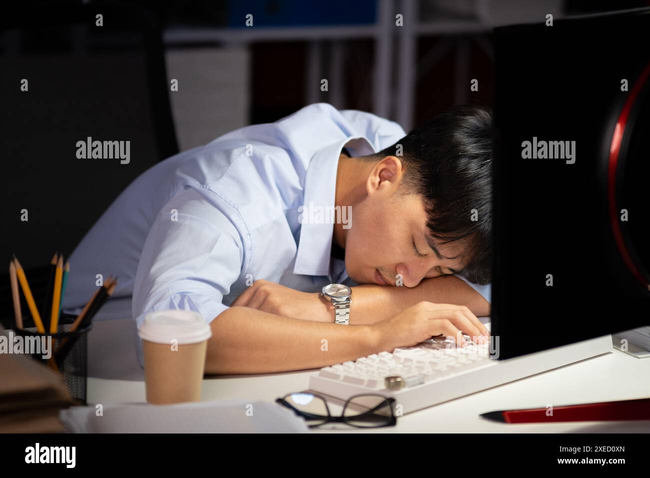 Businessman working overtime at his office He felt tired Stock Photo ...