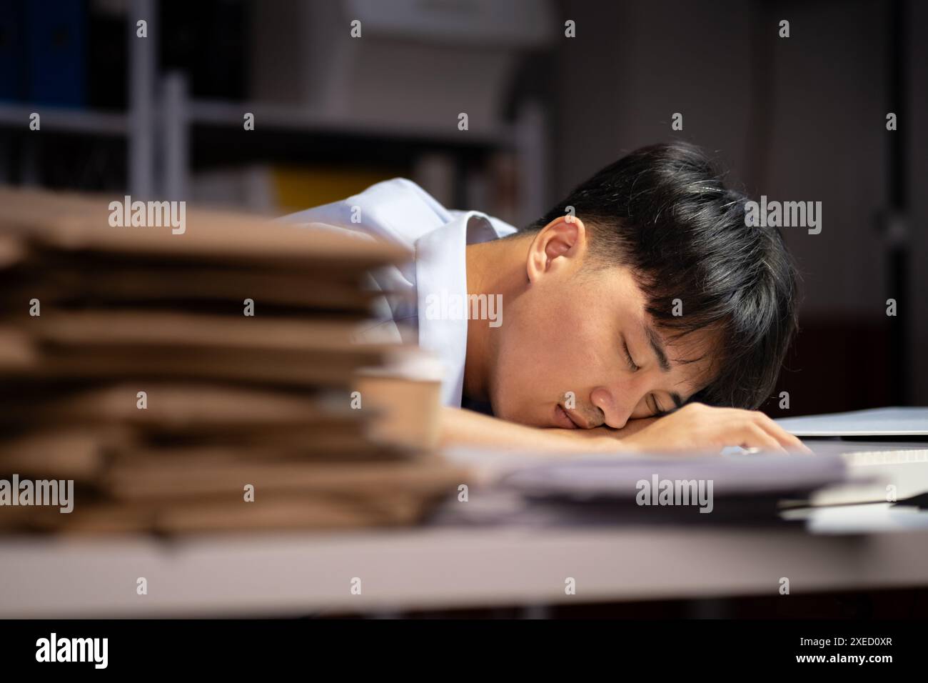 Businessman working overtime at his office He felt tired Stock Photo ...