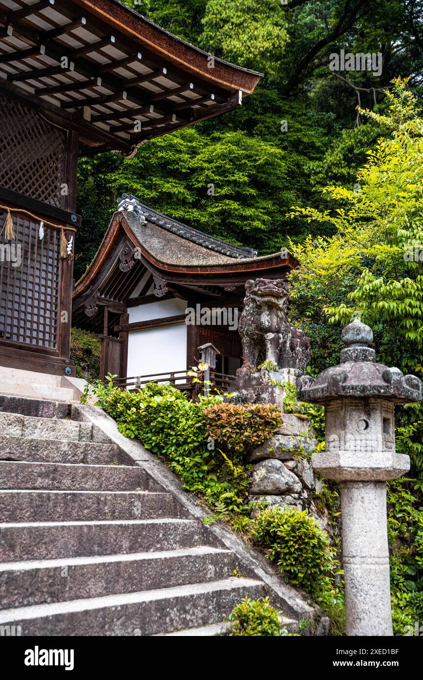 A glimpse of the main hall ("honden") of Ujigami Jinja, a Shinto shrine ...