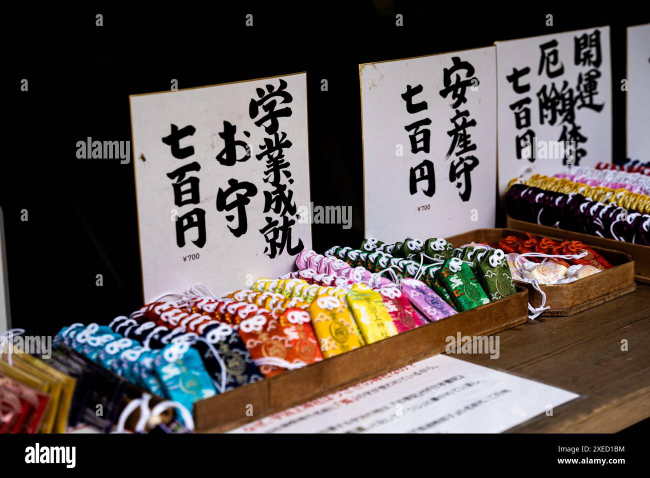 A stall with colorful omamori, Japanese amulets that provide various ...