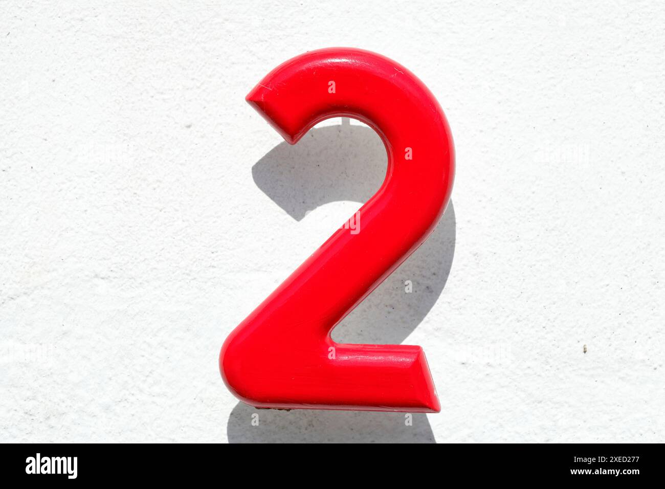 Red Naus license plate number 2 on white background, Germany Stock ...