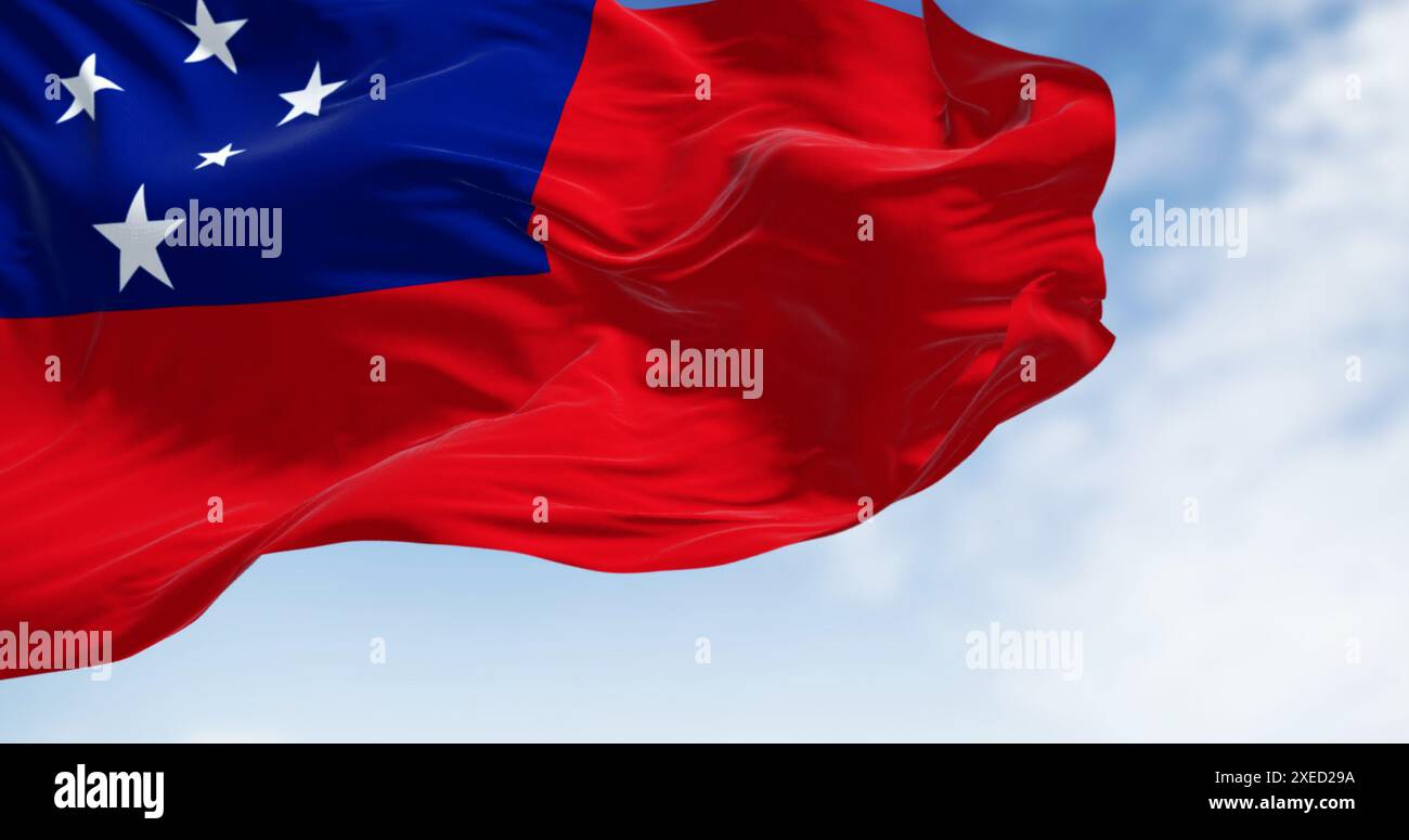 National flag of the Independent State of Samoa waving on a clear day ...