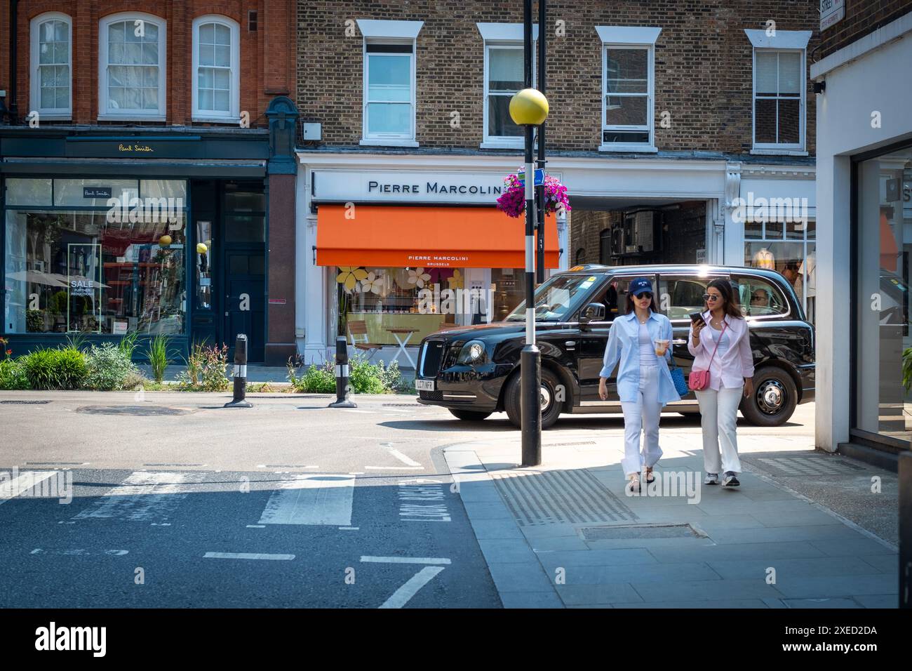 LONDON- JUNE 26, 2024: Marylebone High Street shopping scene. Upmarket ...