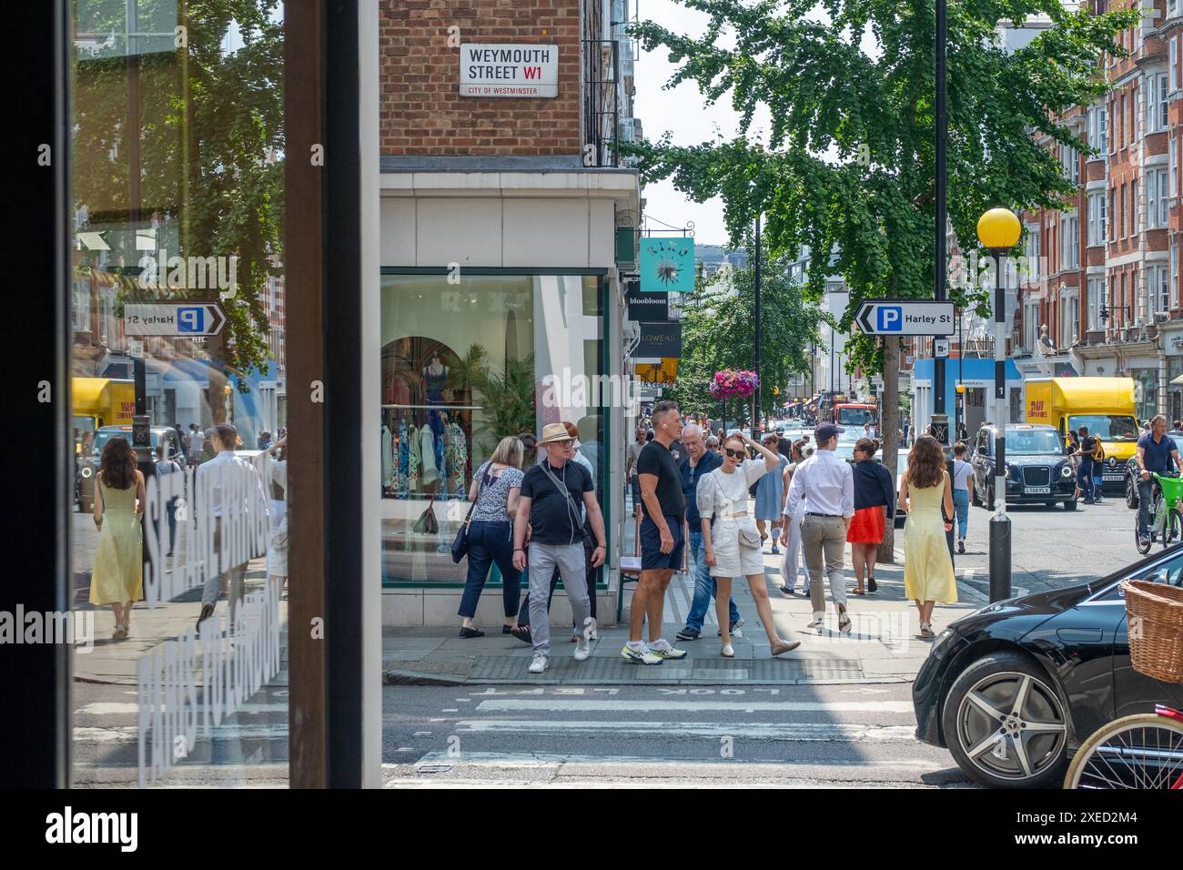 LONDON- JUNE 26, 2024: Marylebone shopping street scene. Upmarket area ...