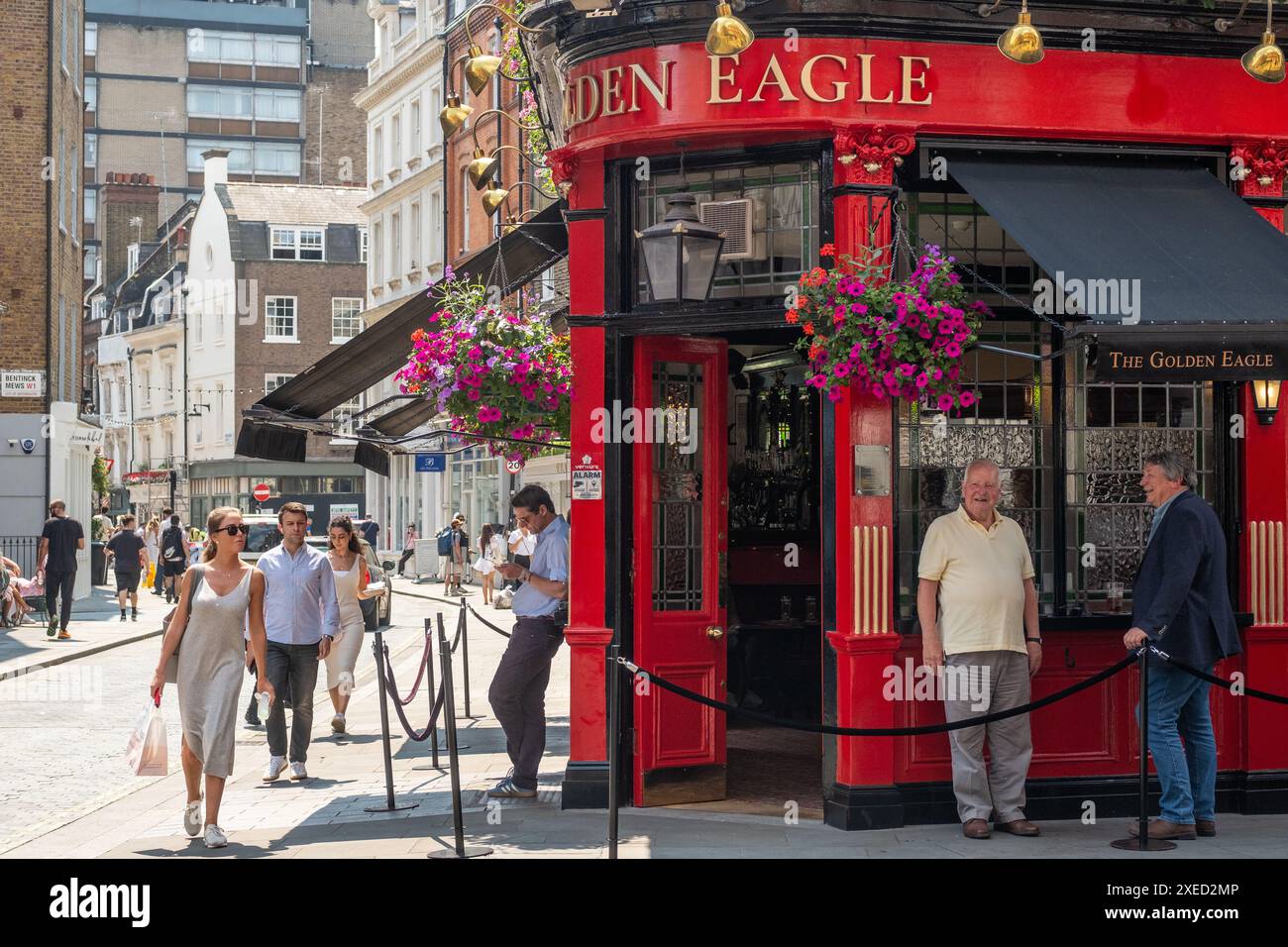 LONDON- JUNE 26, 2024: Marylebone shopping street scene. Upmarket area ...