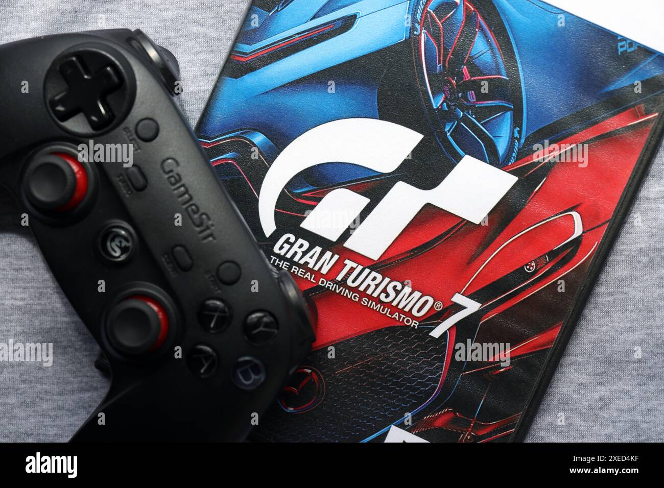 KYIV, UKRAINE - JUNE 26, 2024 Gran Turismo 7 PS5 video game disc box ...