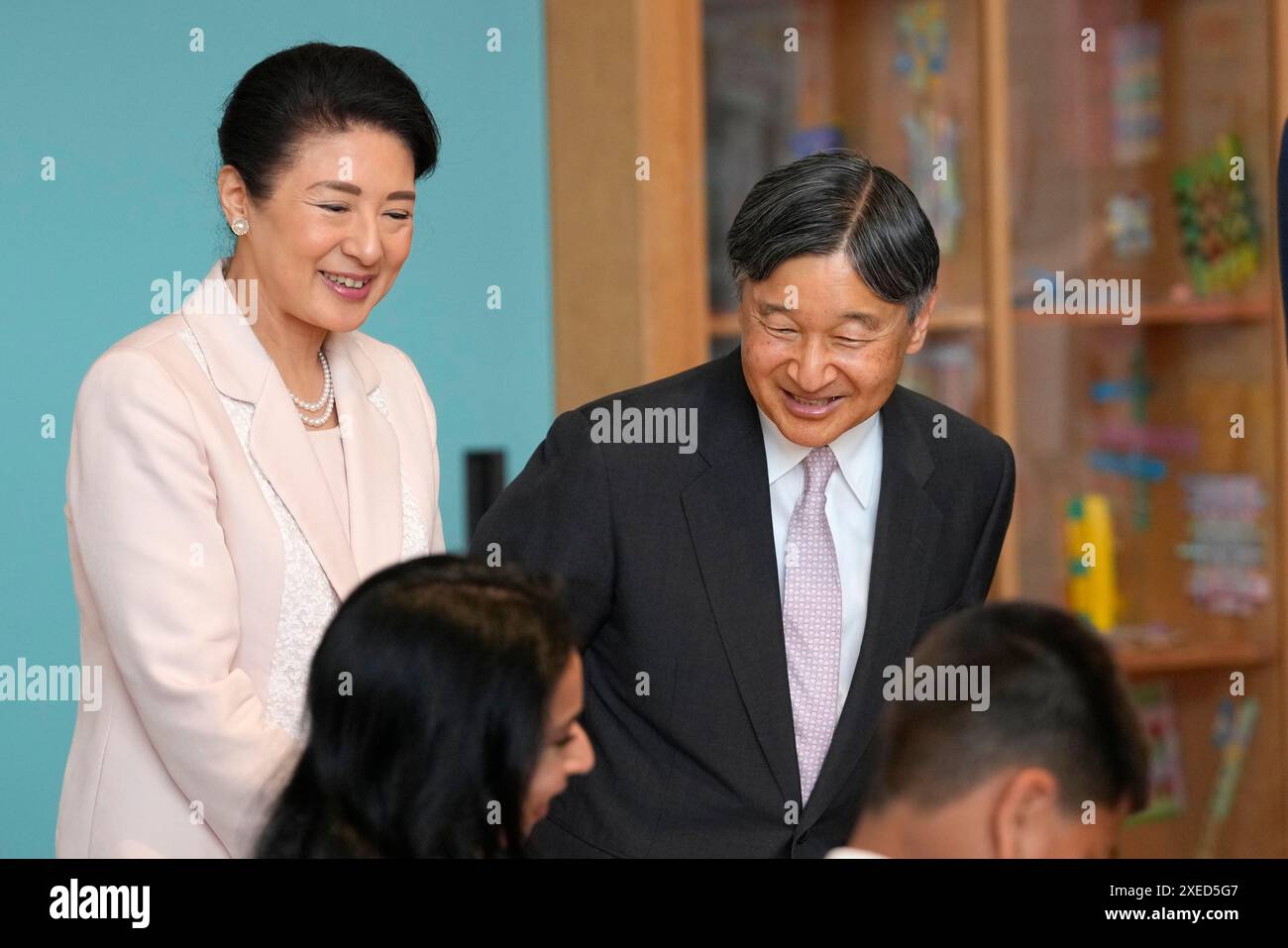Emperor Naruhito and his wife Empress Masako of Japan watch children ...