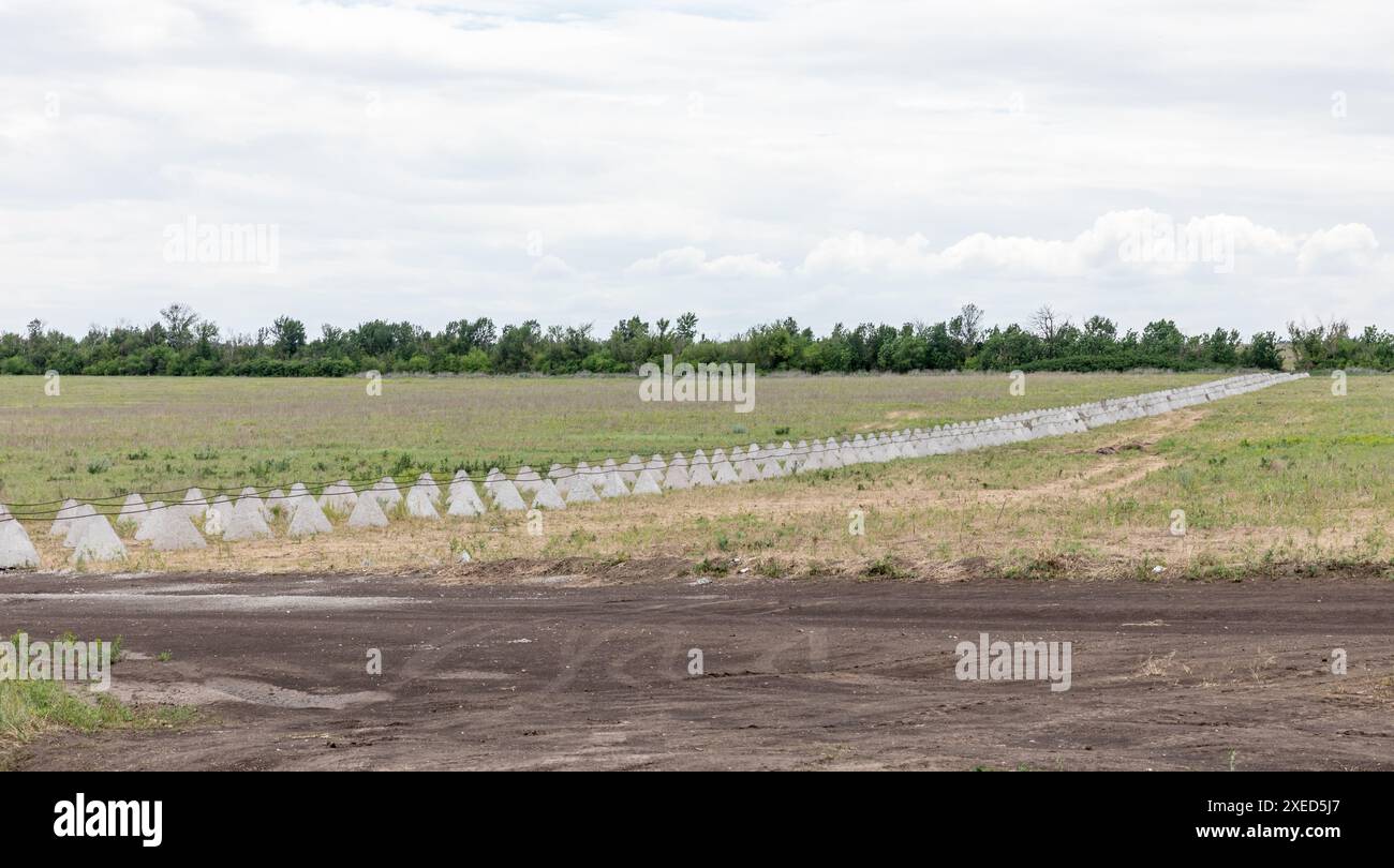 War in Ukraine. Fortifications anti tank dragons teeth in Donetsk ...