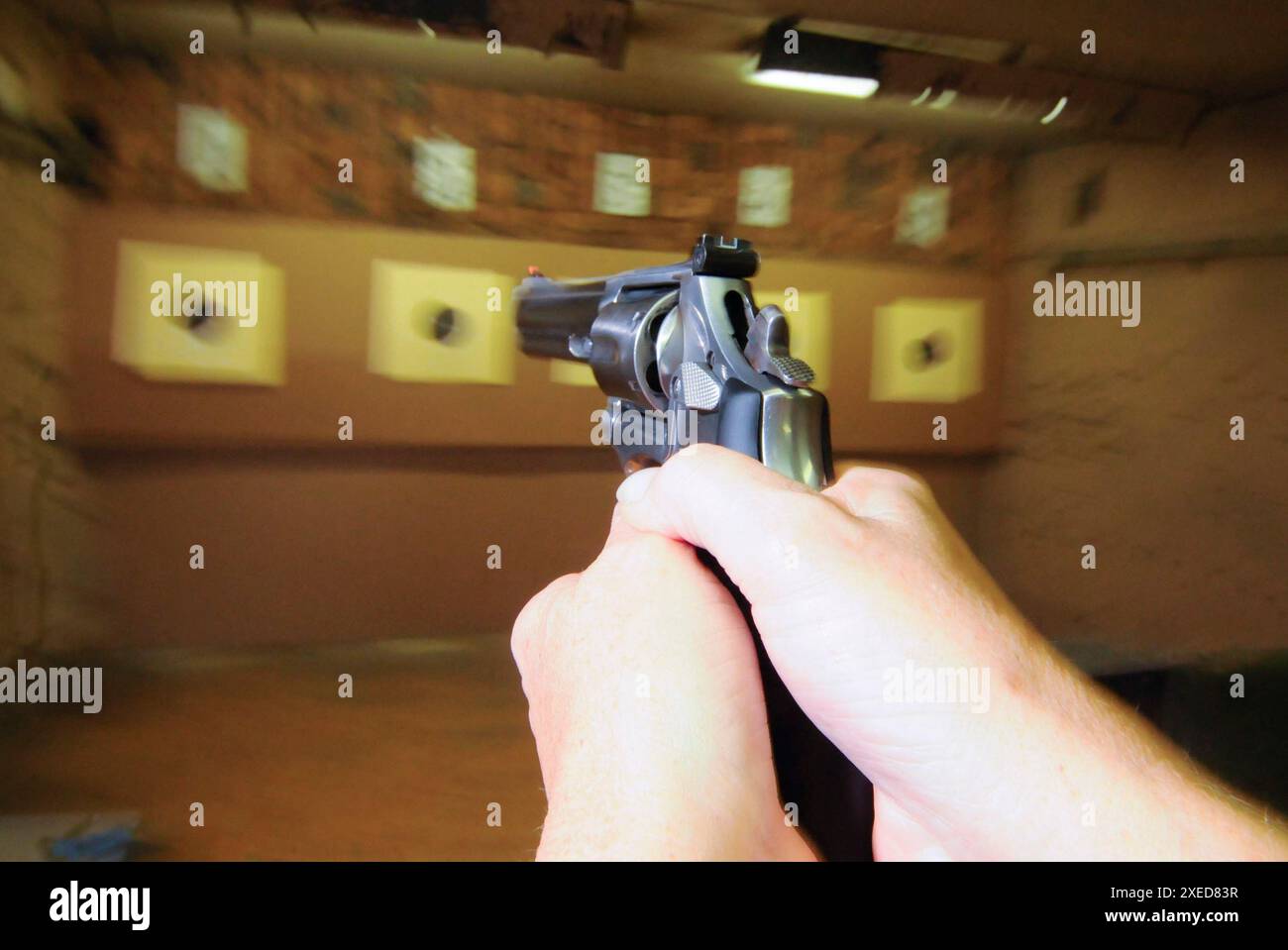 Target shooter at a shooting range Stock Photo - Alamy