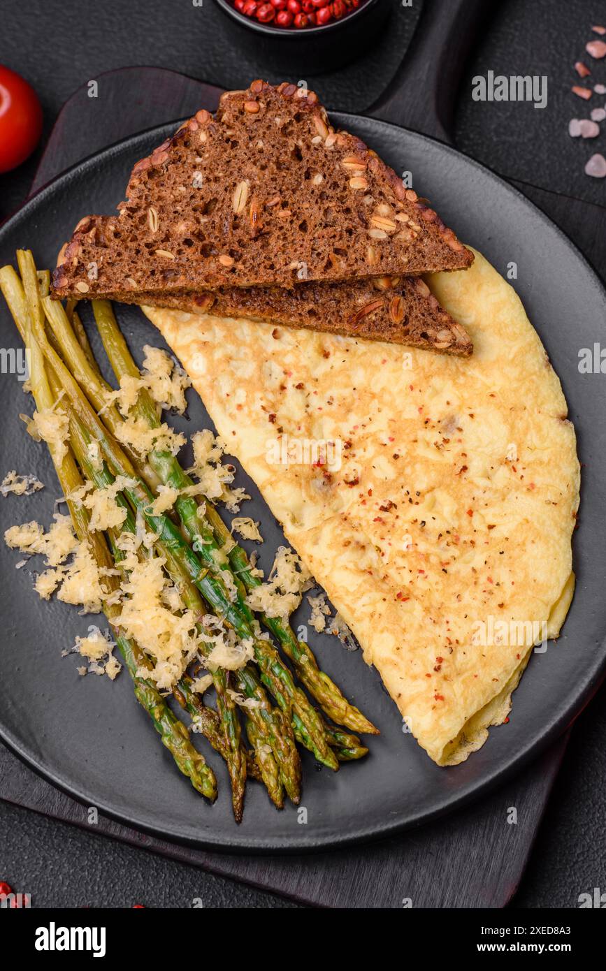 Delicious nutritious breakfast consisting of asparagus, scrambled eggs ...