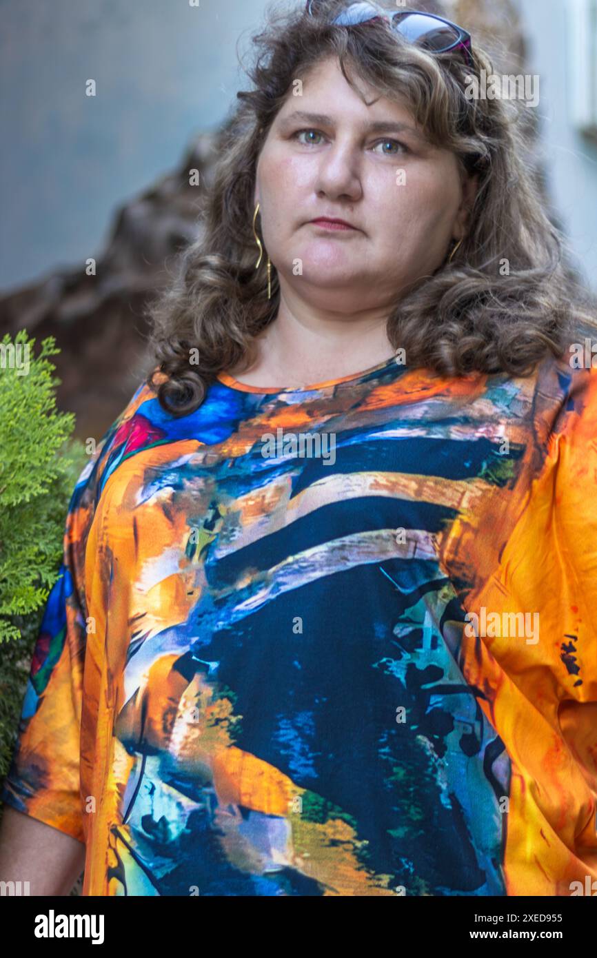 This image captures a beautiful blonde woman whose face is clearly ...