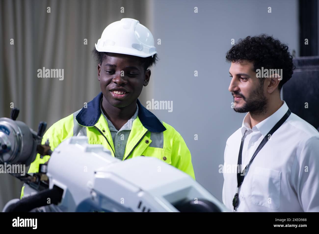 Businessperson of factory industry inspection and testing of robots arm ...