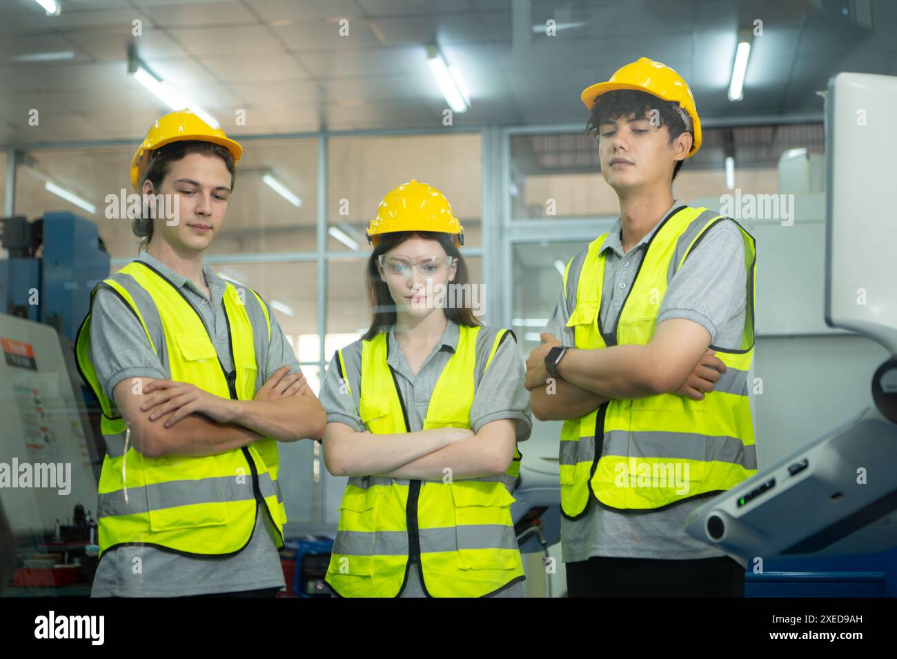 Group of factory workers greeting each other with joint hands together ...