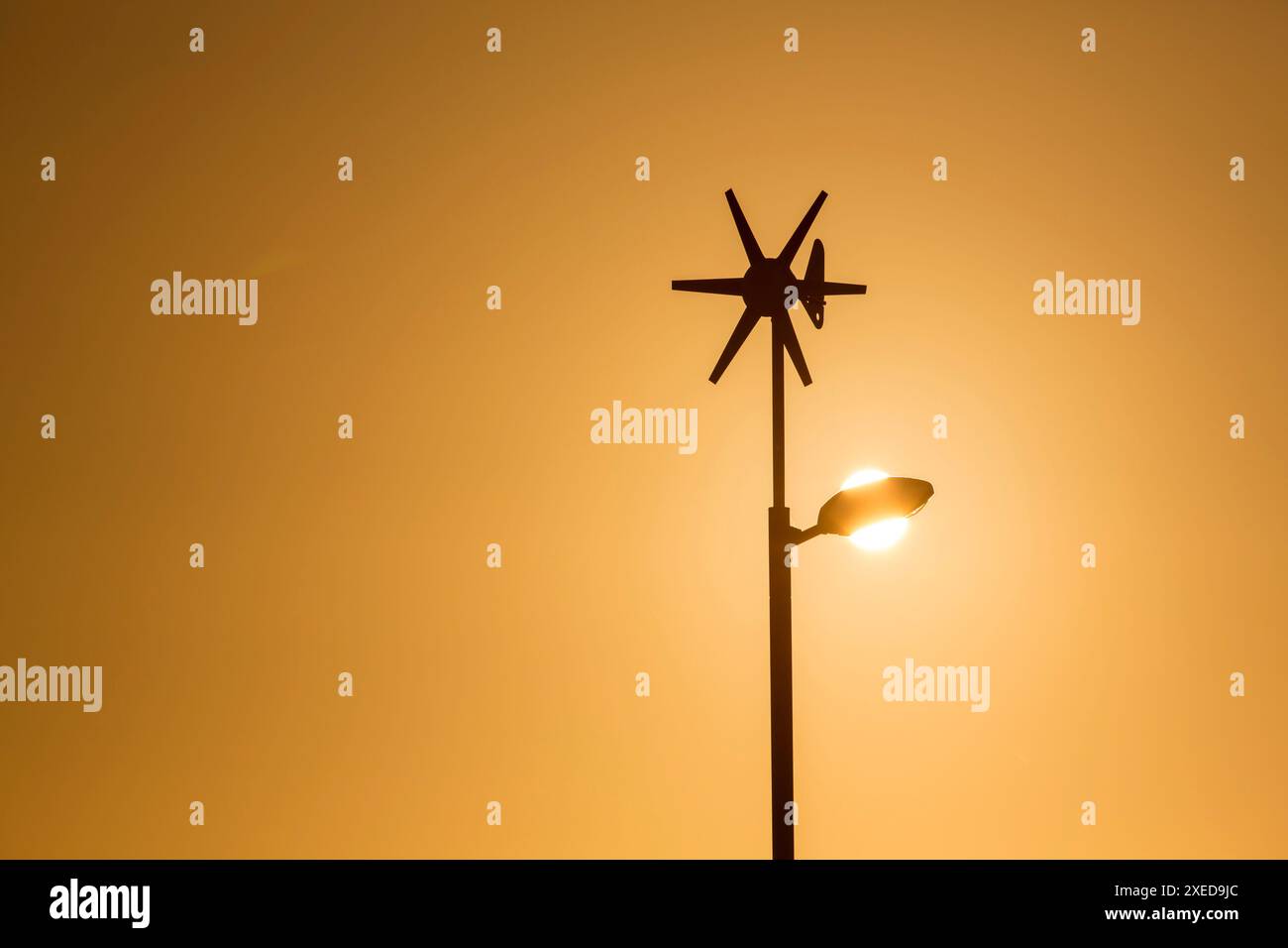 A street lamp using wind turbine to generate electricity adn store ...