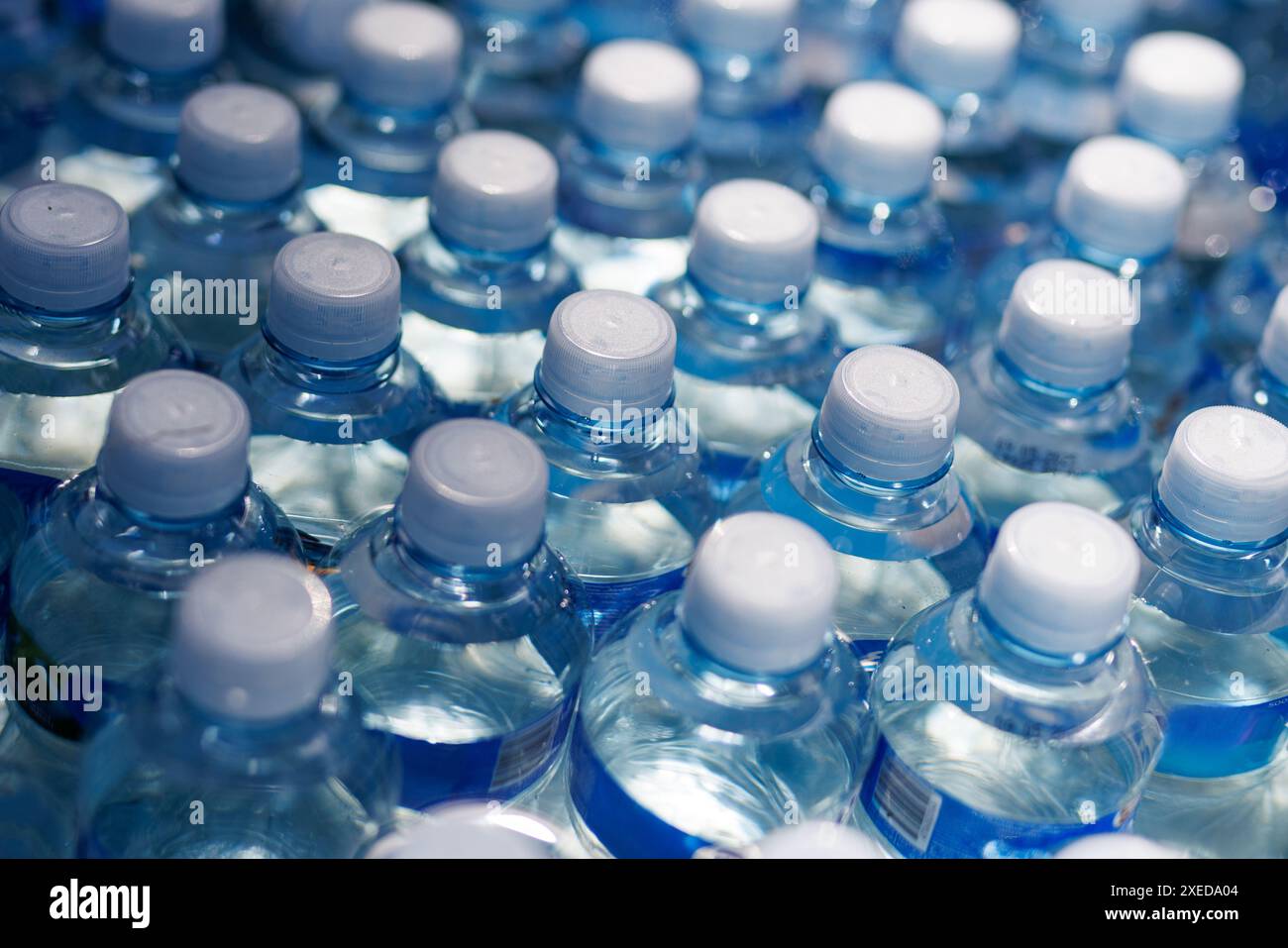 Refreshing Pattern of Packed Water Bottles with White Caps Stock Photo ...