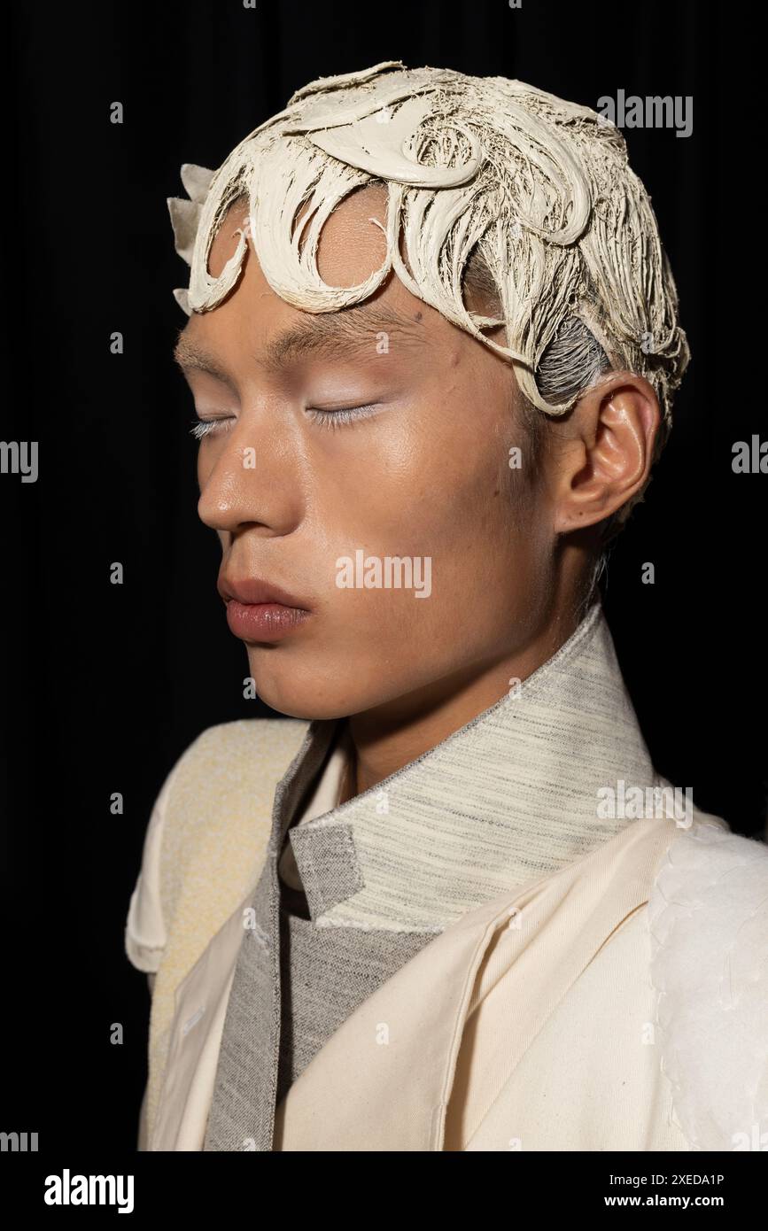 Models prepare backstage at the Thom Browne Haute Couture Fall-Winter ...
