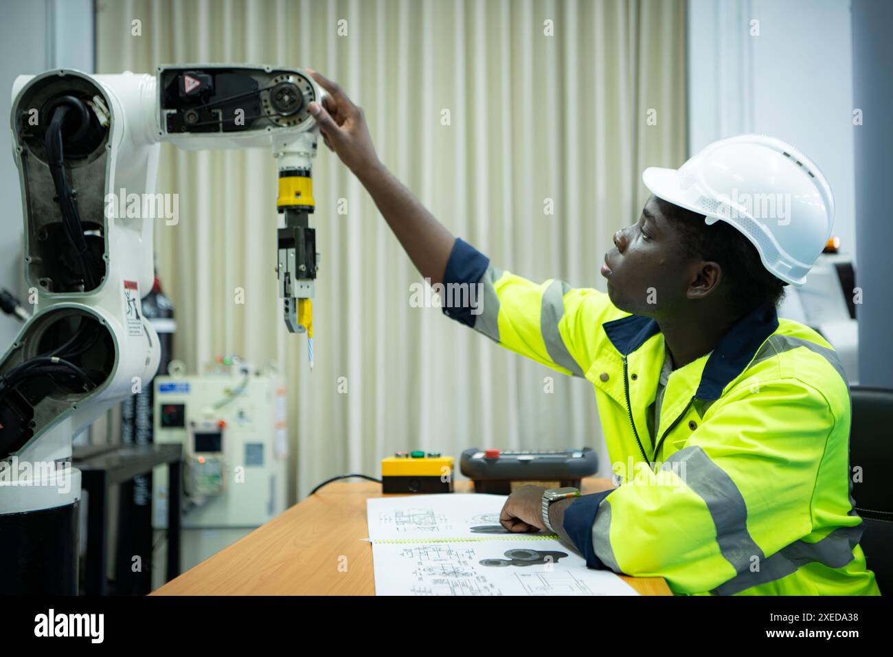 Engineers assembled and tested the functionality of a robotic arm ...