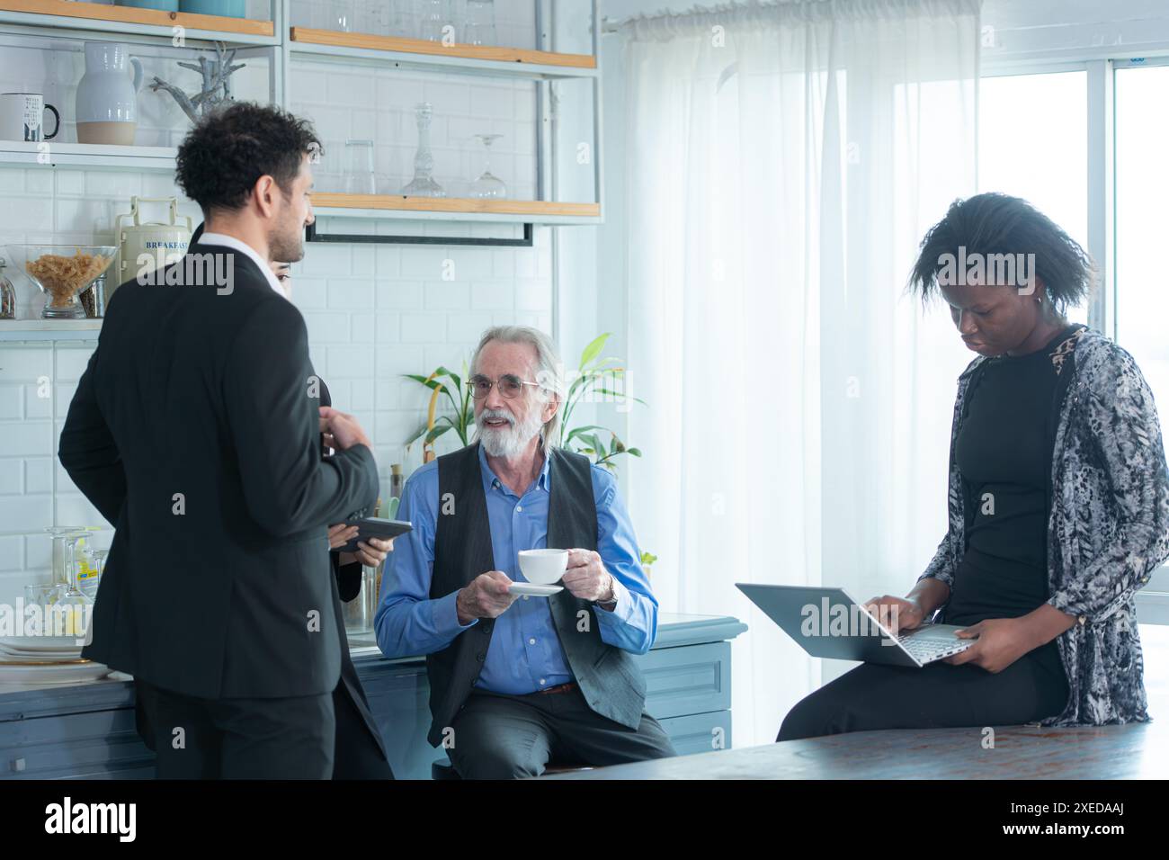 Simple meeting of small business owners, using their home as a ...