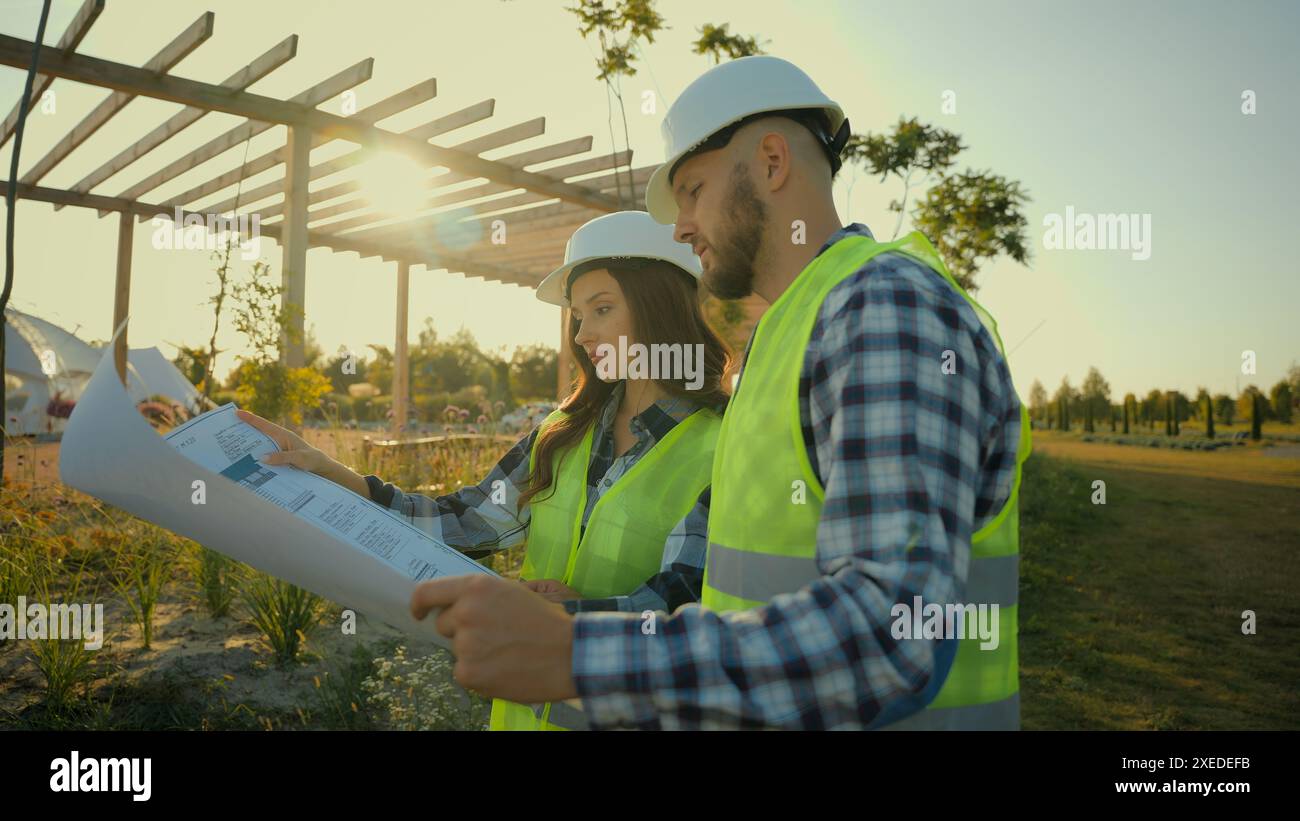 Female male workers Caucasian woman man builders girl guy engineers ...