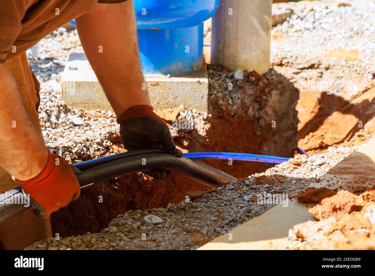 To ensure thermal isolation of water pvc pipe, plumber applied thermal ...