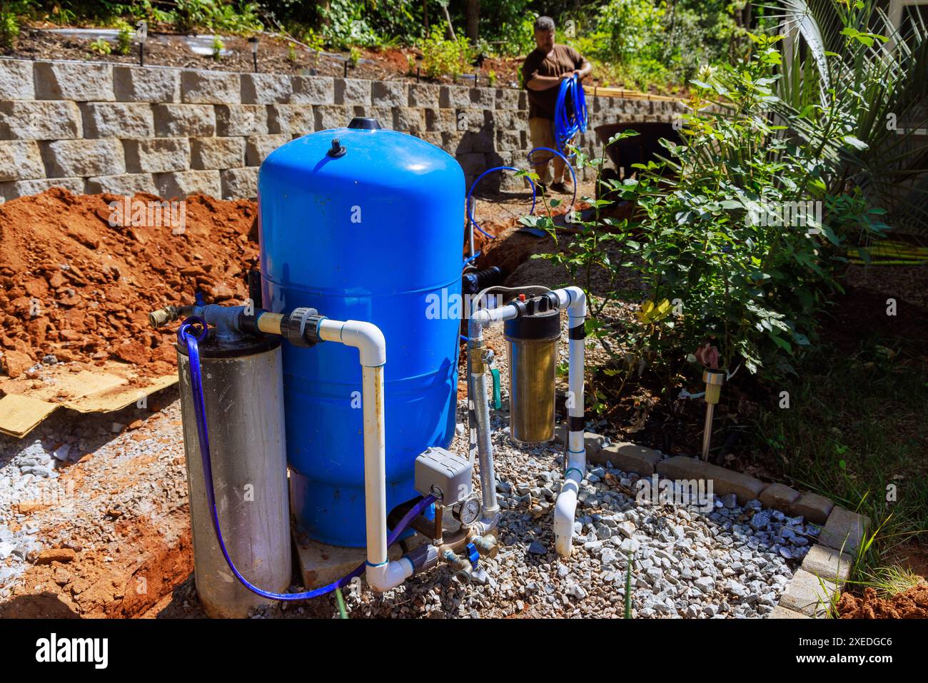 PVC pipe in trench ready to be connected to home well water system ...