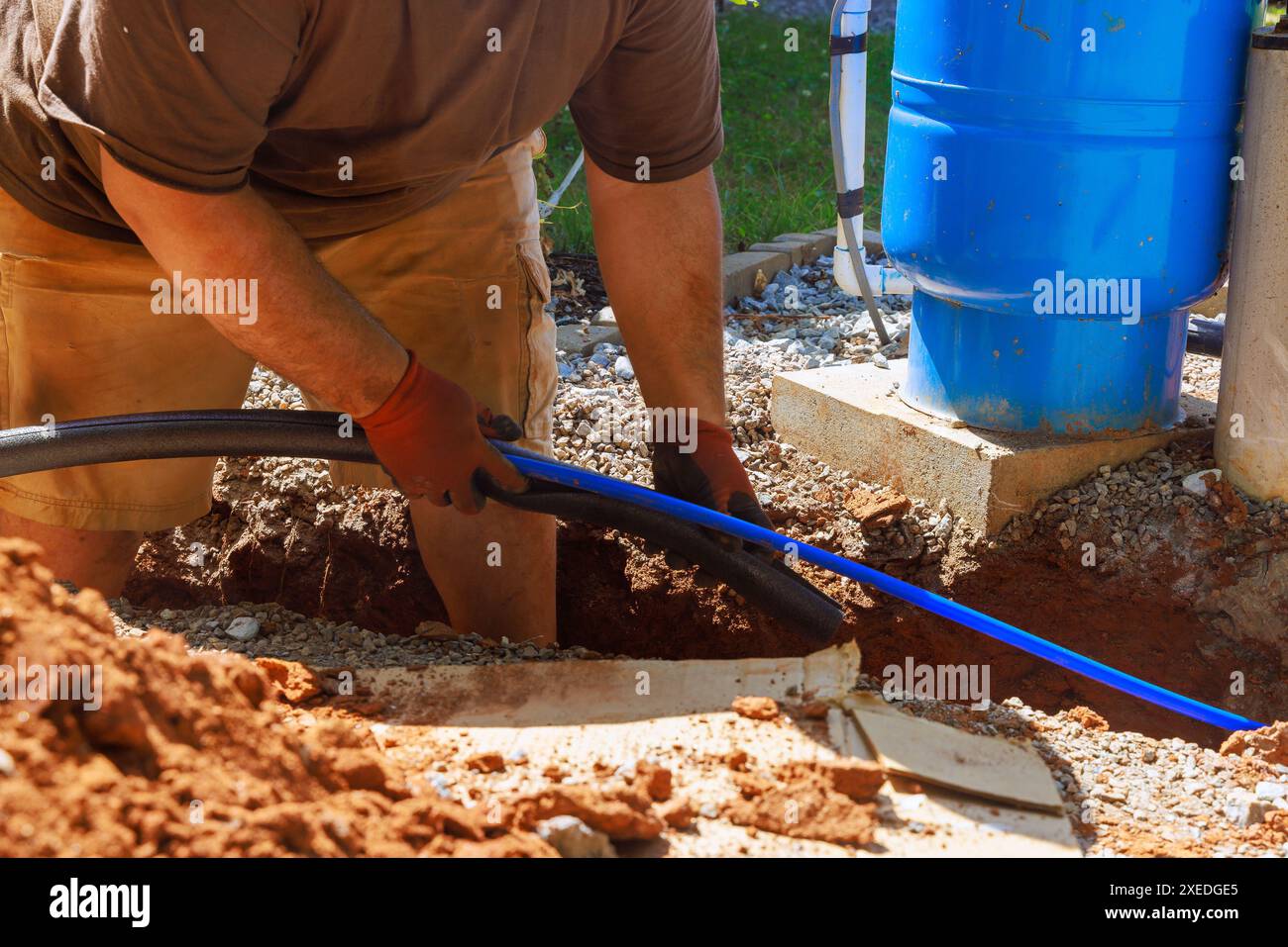 To isolate the water pvc pipe from outside environment, plumber applied ...