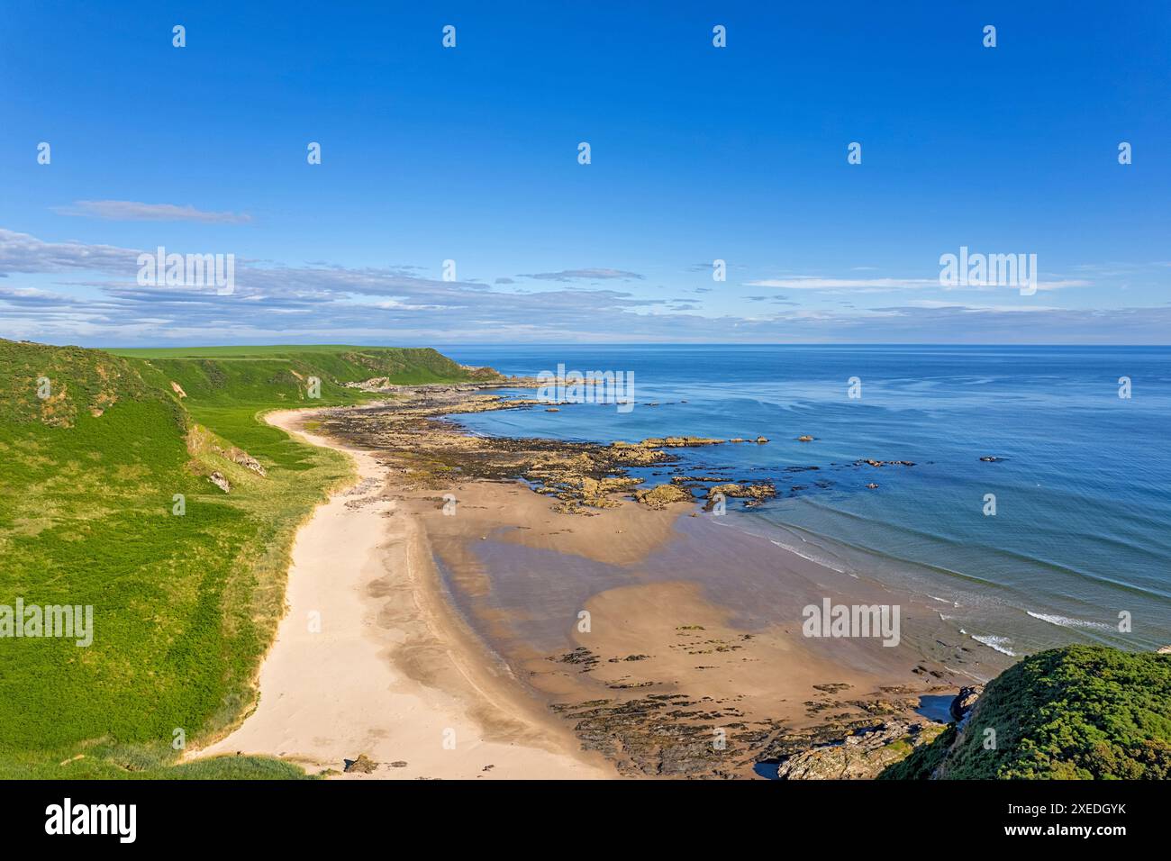 Sunnyside Beach and Bay Cullen Scotland blue sky and a perfect early ...