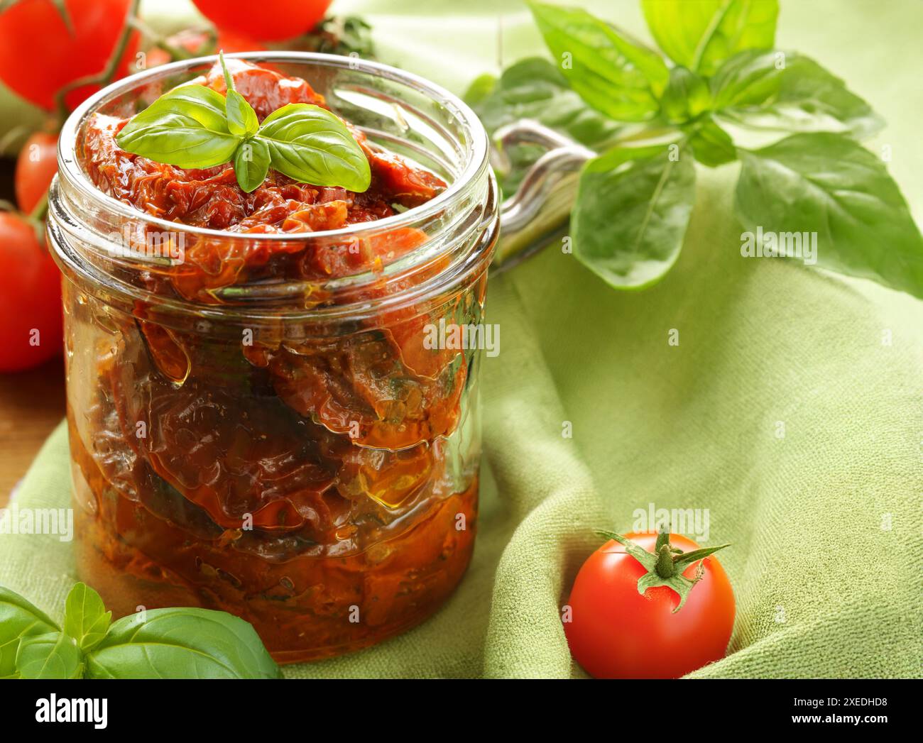 traditional Italian sun-dried tomatoes in oil with basil Stock Photo ...