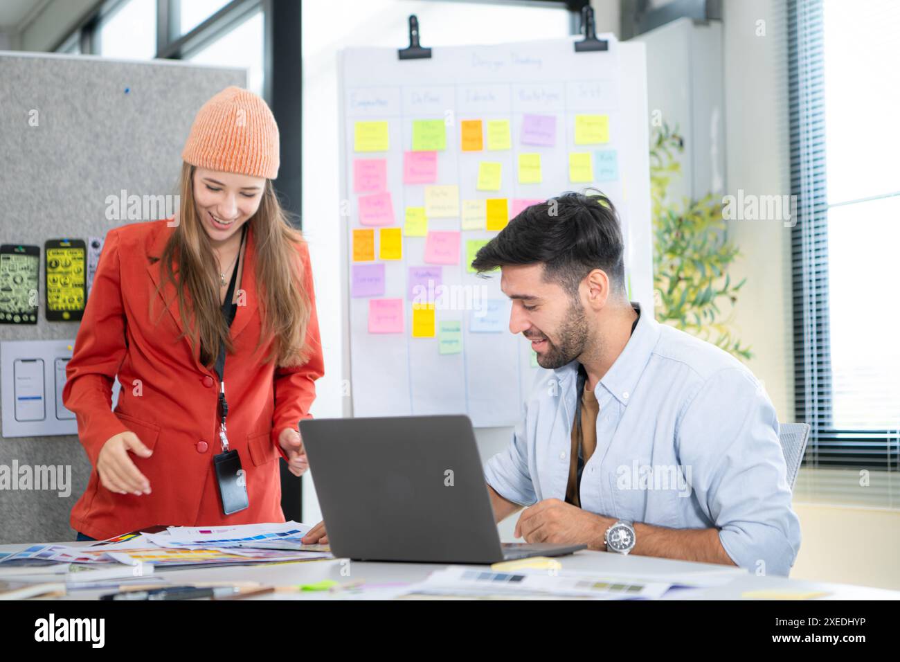 Multiethnic young business people working together in modern office ...