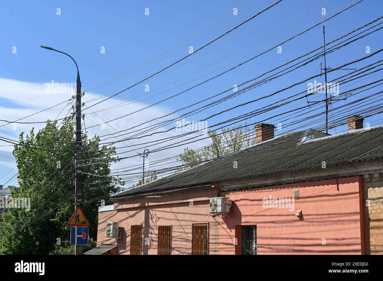 electrical wires on a pole. a lot of wires Stock Photo - Alamy