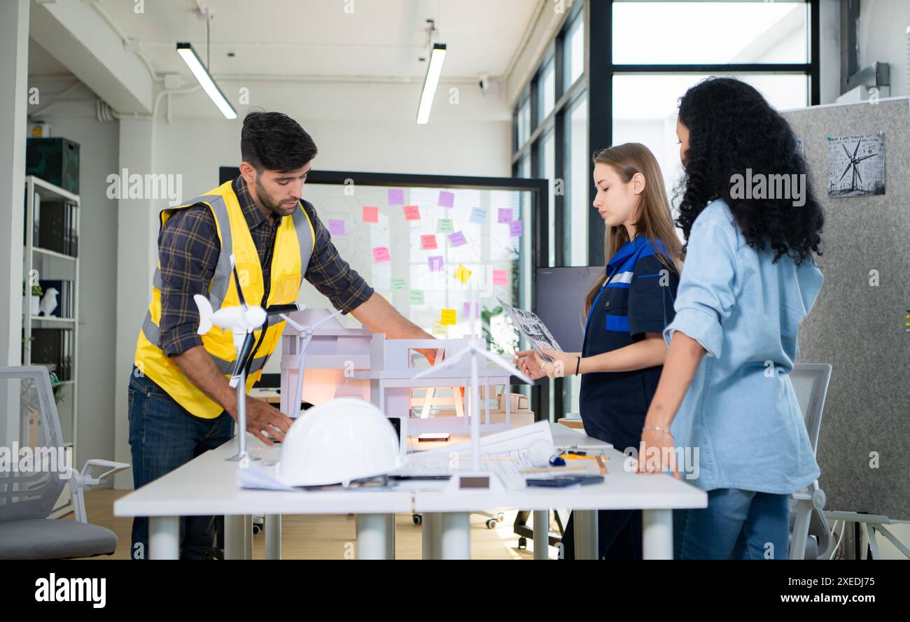 Engineers, architects, and designers collaborate to design a building ...